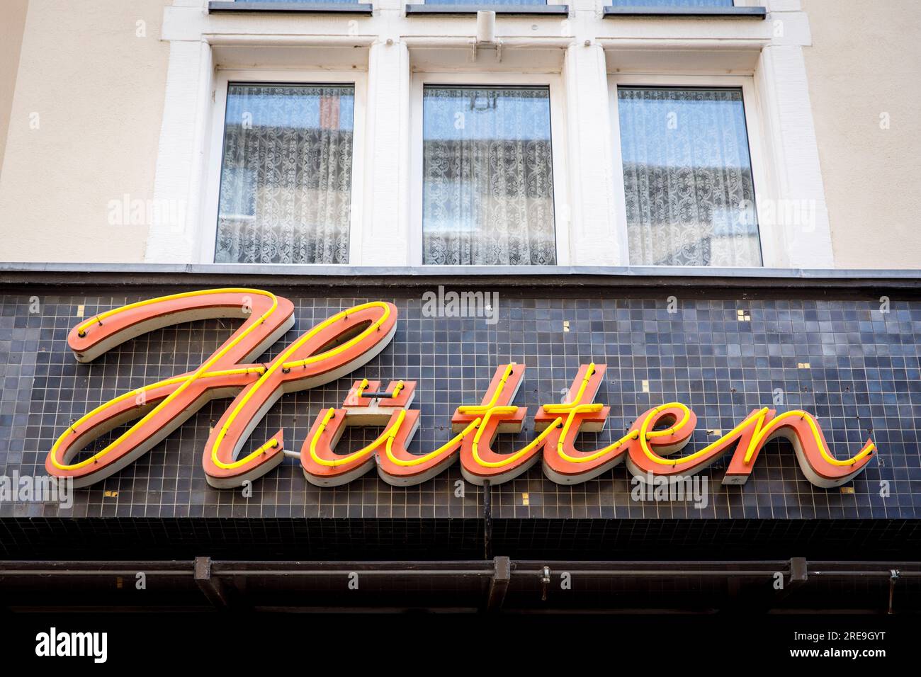 old neon sign at a store on the street Deutzer Freiheit in the district ...