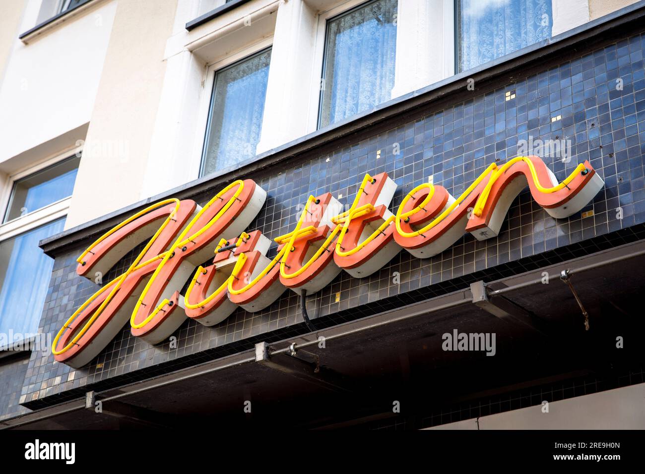 old neon sign at a store on the street Deutzer Freiheit in the district ...