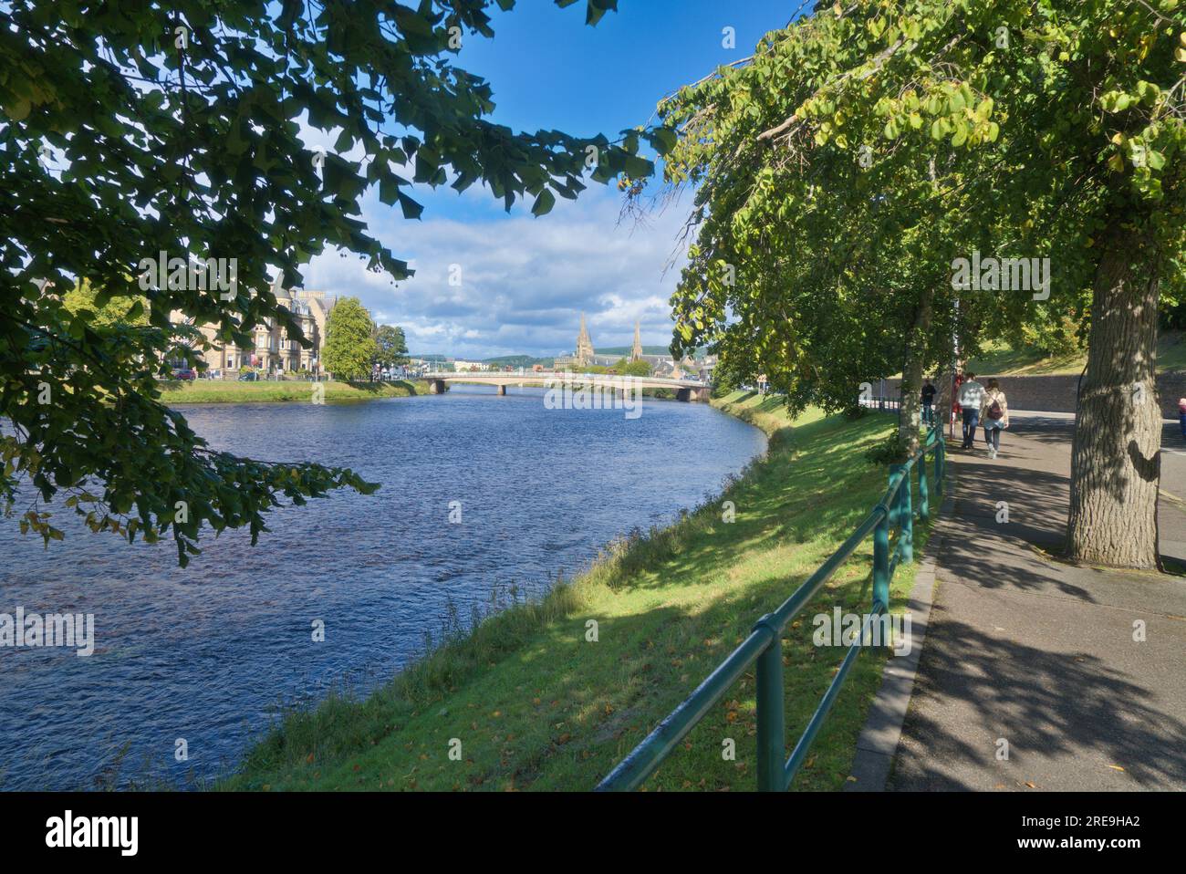 Looking north up tree lined footpath beside River ness (towards city ...