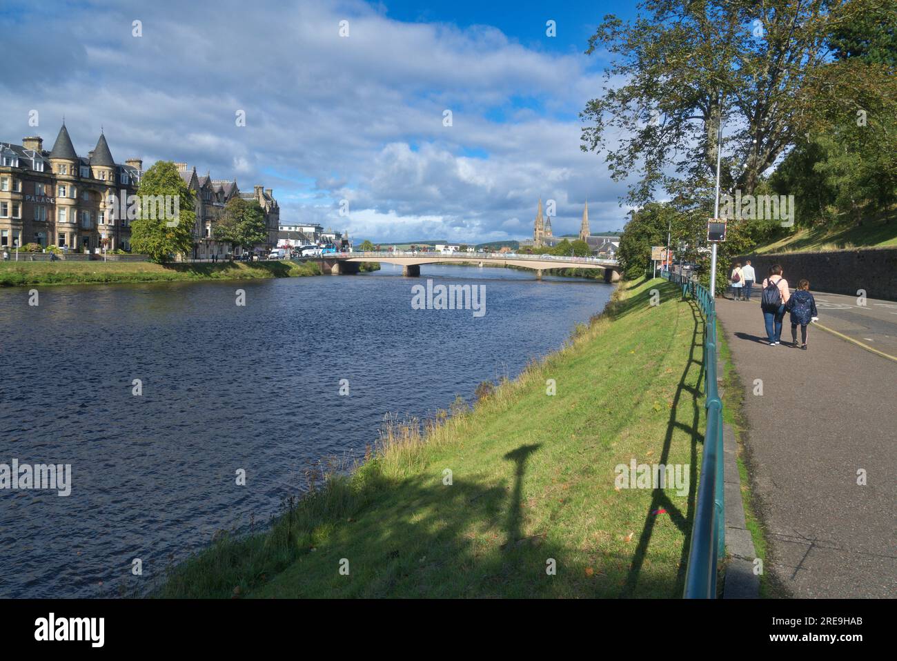 Looking north up tree lined footpath beside River ness (towards city ...
