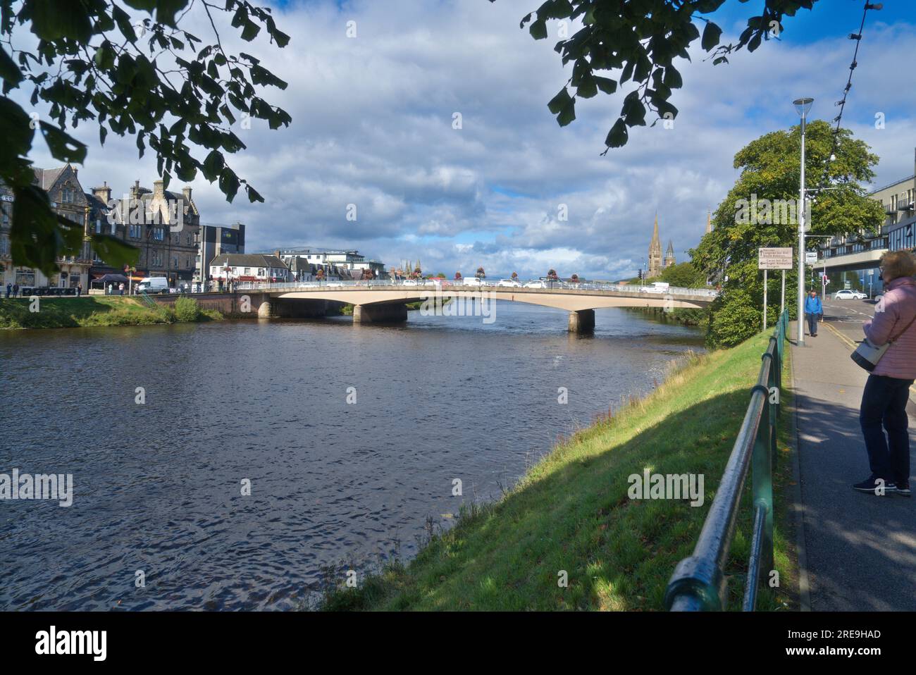 Looking north up tree lined footpath beside River ness (towards city ...