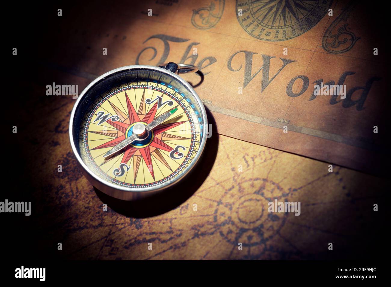 Close-up of a vintage compass on an antique paper map Stock Photo - Alamy
