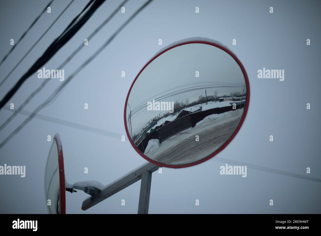 Spherical mirror for safety. Spherical mirror on road. Reflection in ...