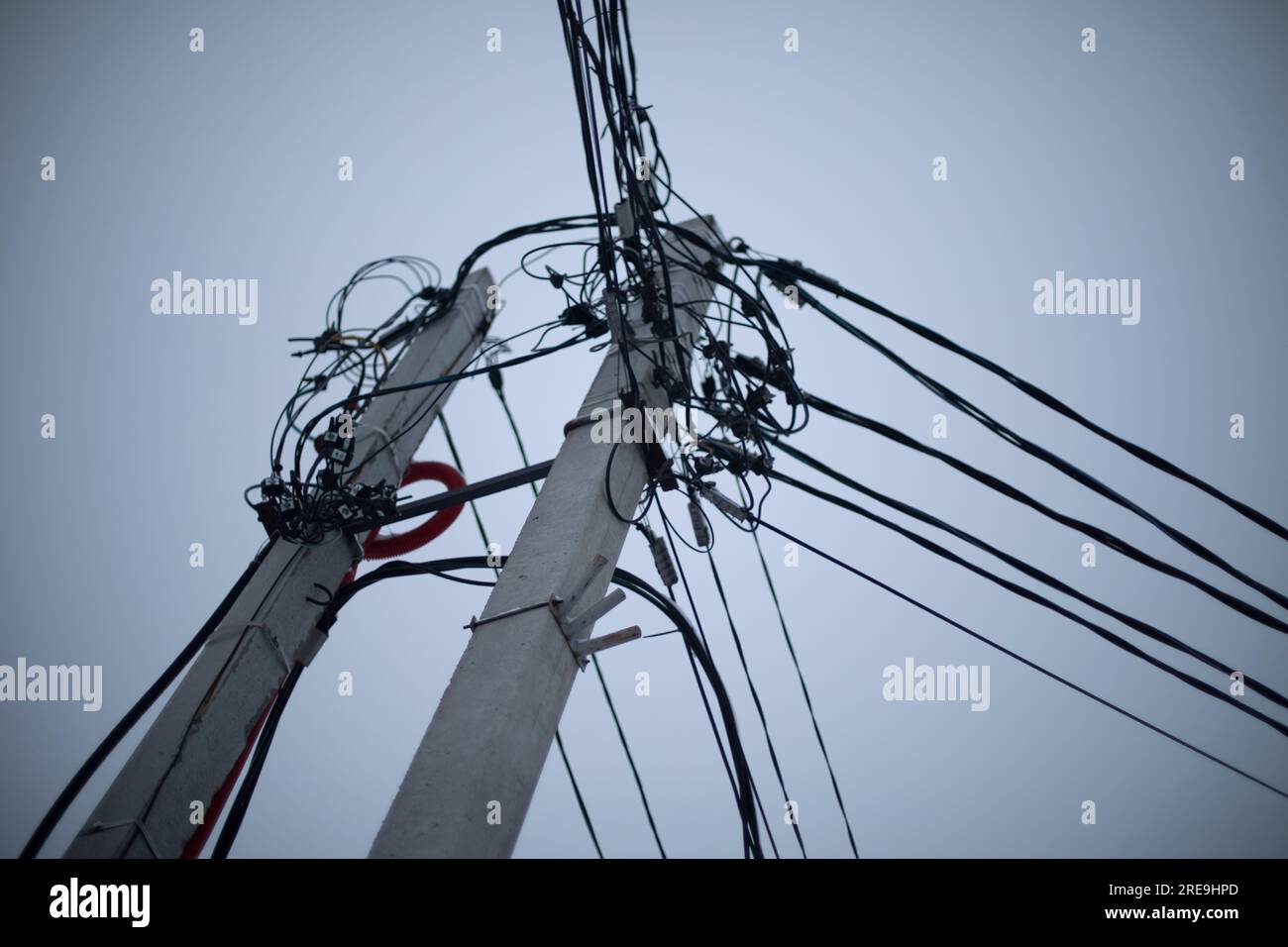 Electrical wires against sky. Wires on pole. Urban infrastructure. High ...