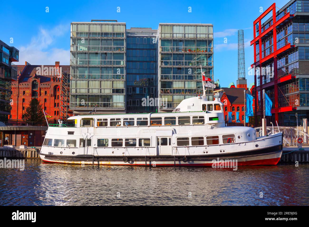 View of HafenCity quarter in Hamburg, Germany . Boat at water canal ...