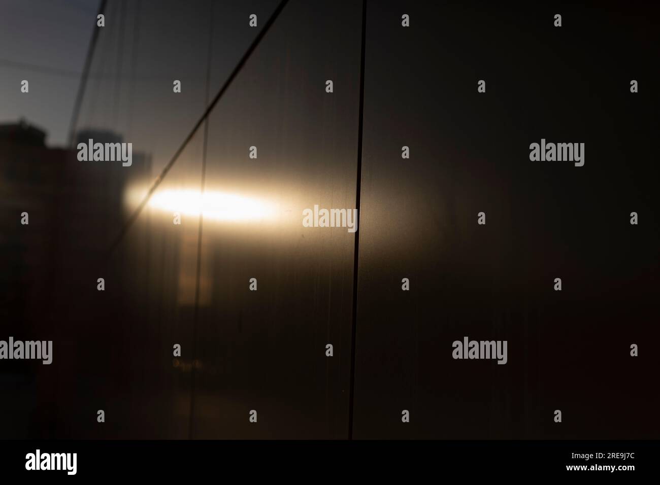 Glare of light on tile. Ray of sunshine on surface. Reflection on ...