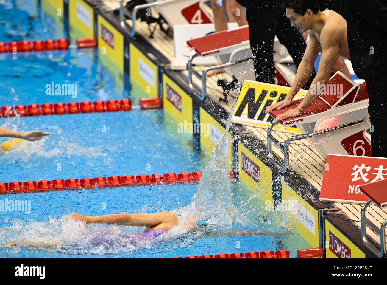 Fukuoka, Japan. 26th July, 2023. Cheng Yujie (bottom) of Team China ...