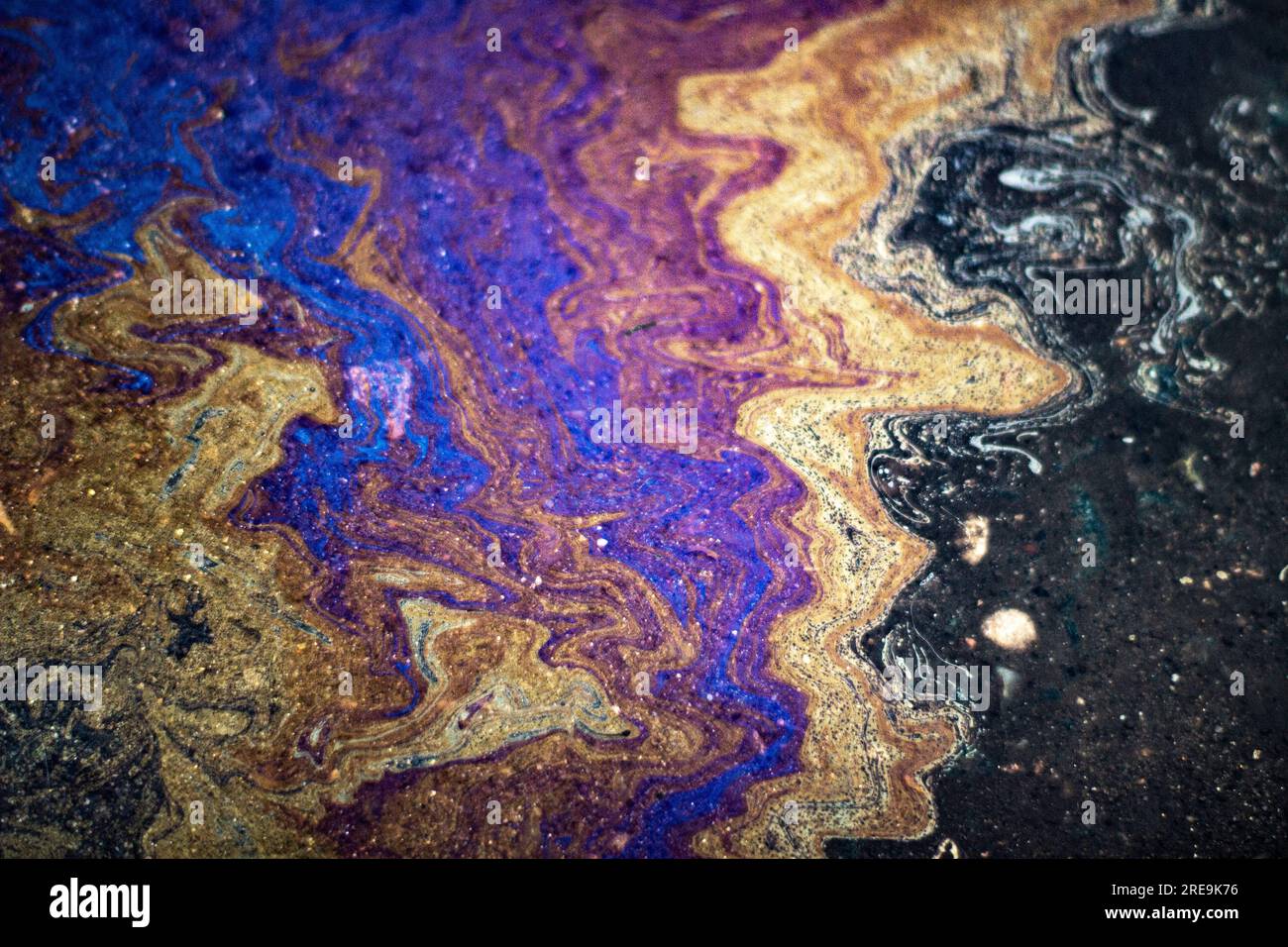 Spot gasoline. Puddle of fuel. Acid colors. Texture bright liquid Stock ...