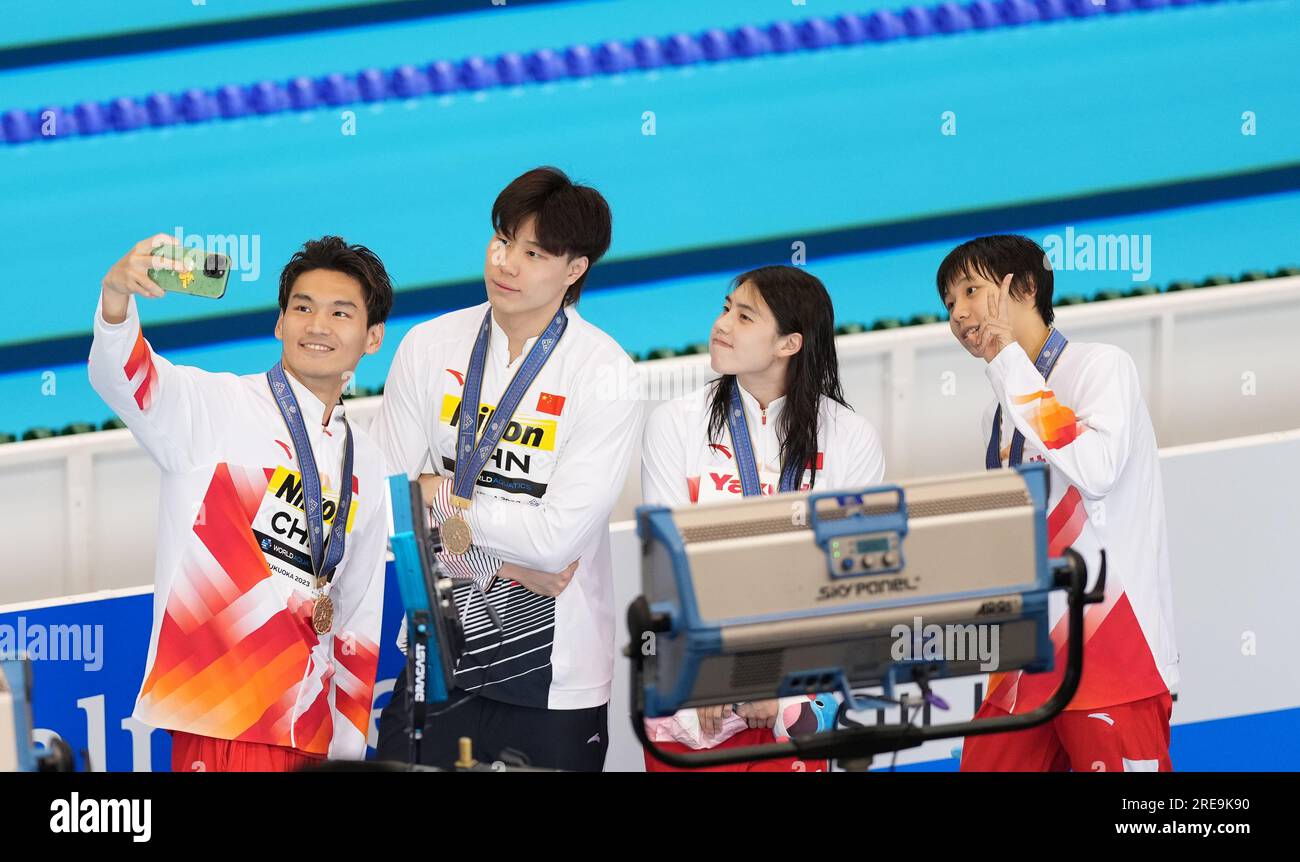 Fukuoka, Japan. 26th July, 2023. Gold medalists Xu Jiayu, Qin Haiyang ...