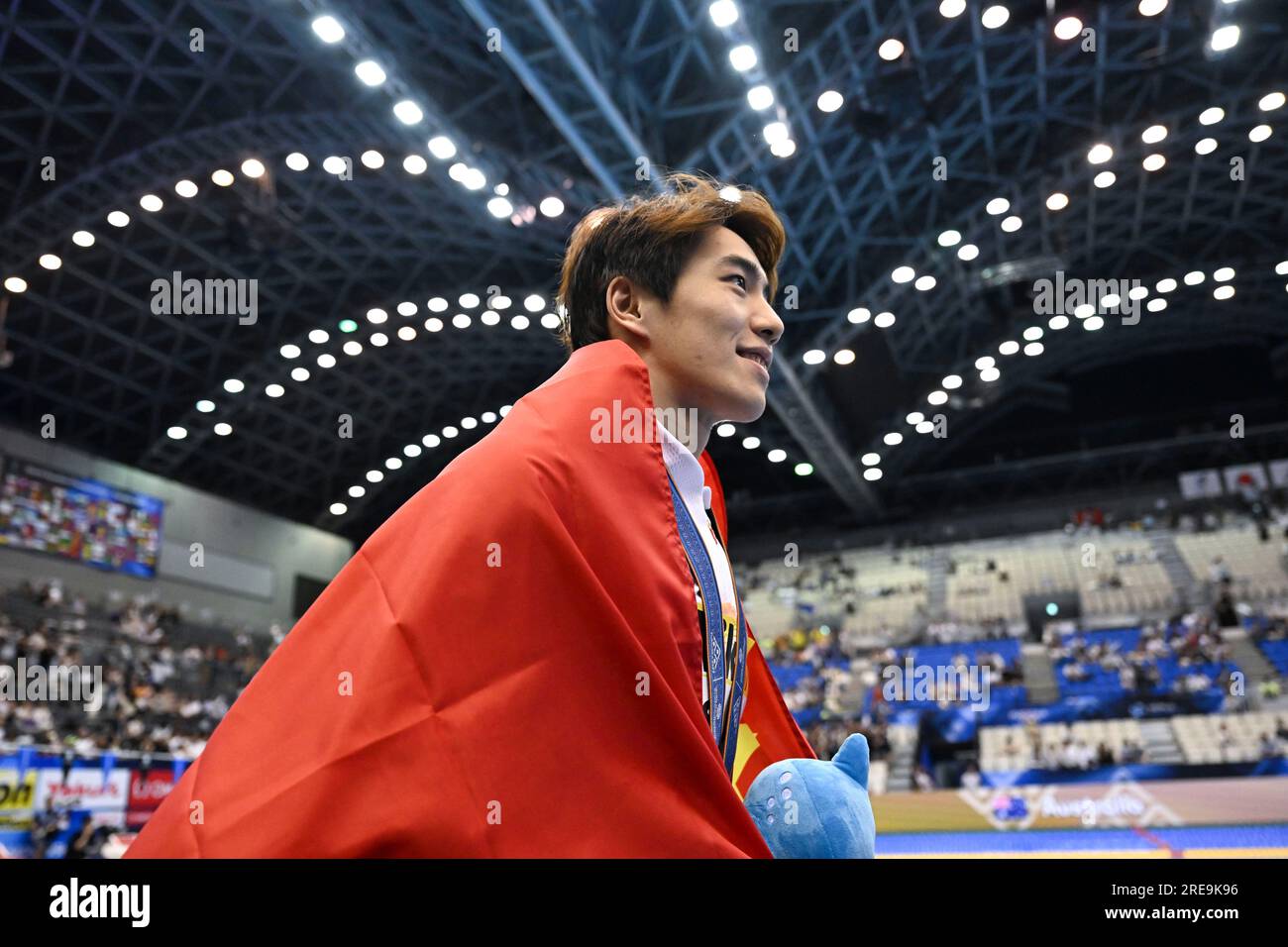 Fukuoka, Japan. 26th July, 2023. Bronze medalist Sun Jiajun of China reacts after the award ...