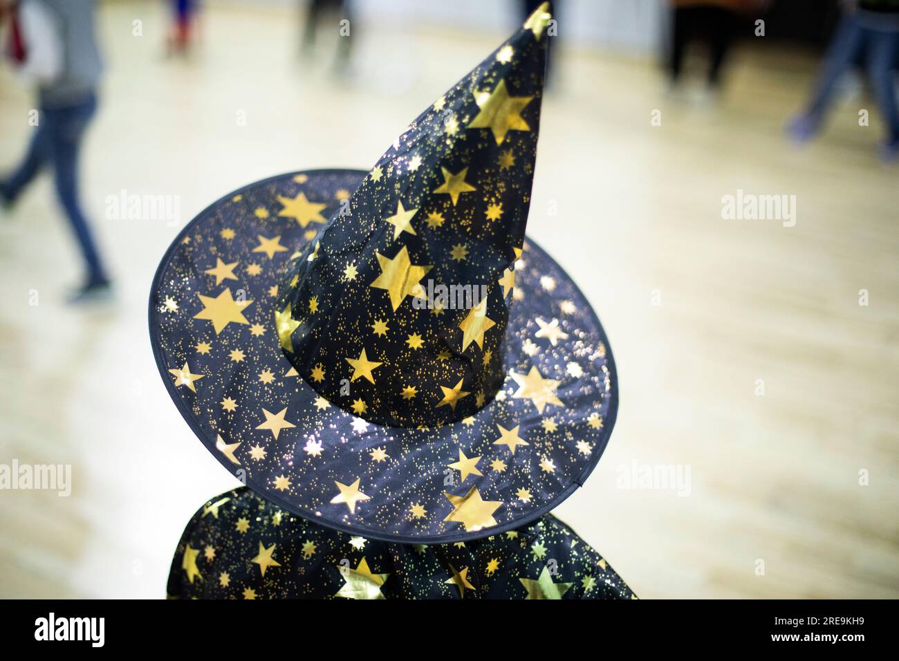 Wizard hat. Child at holiday. Cap on head. Details of children's play ...