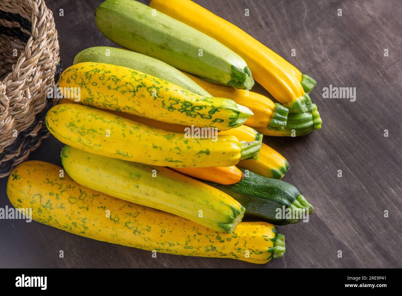 Yellow green leopard spotted zucchini. Vegetables on the table ...