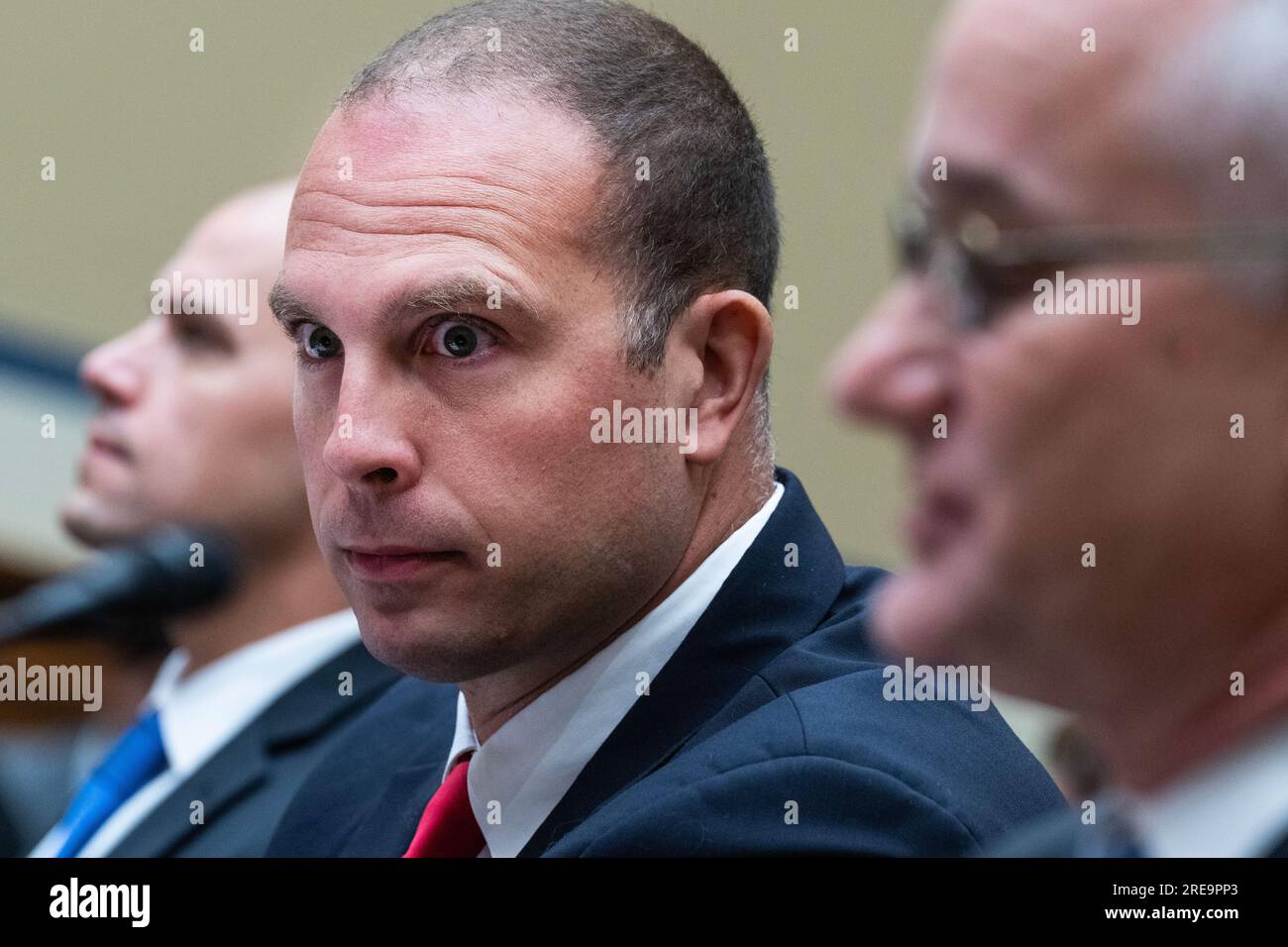 UNITED STATES - JULY 26: From left, Ryan Graves, executive director of ...