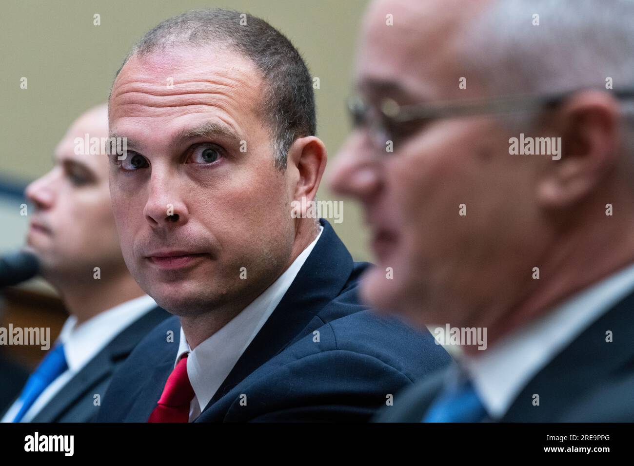 UNITED STATES - JULY 26: From left, Ryan Graves, executive director of ...