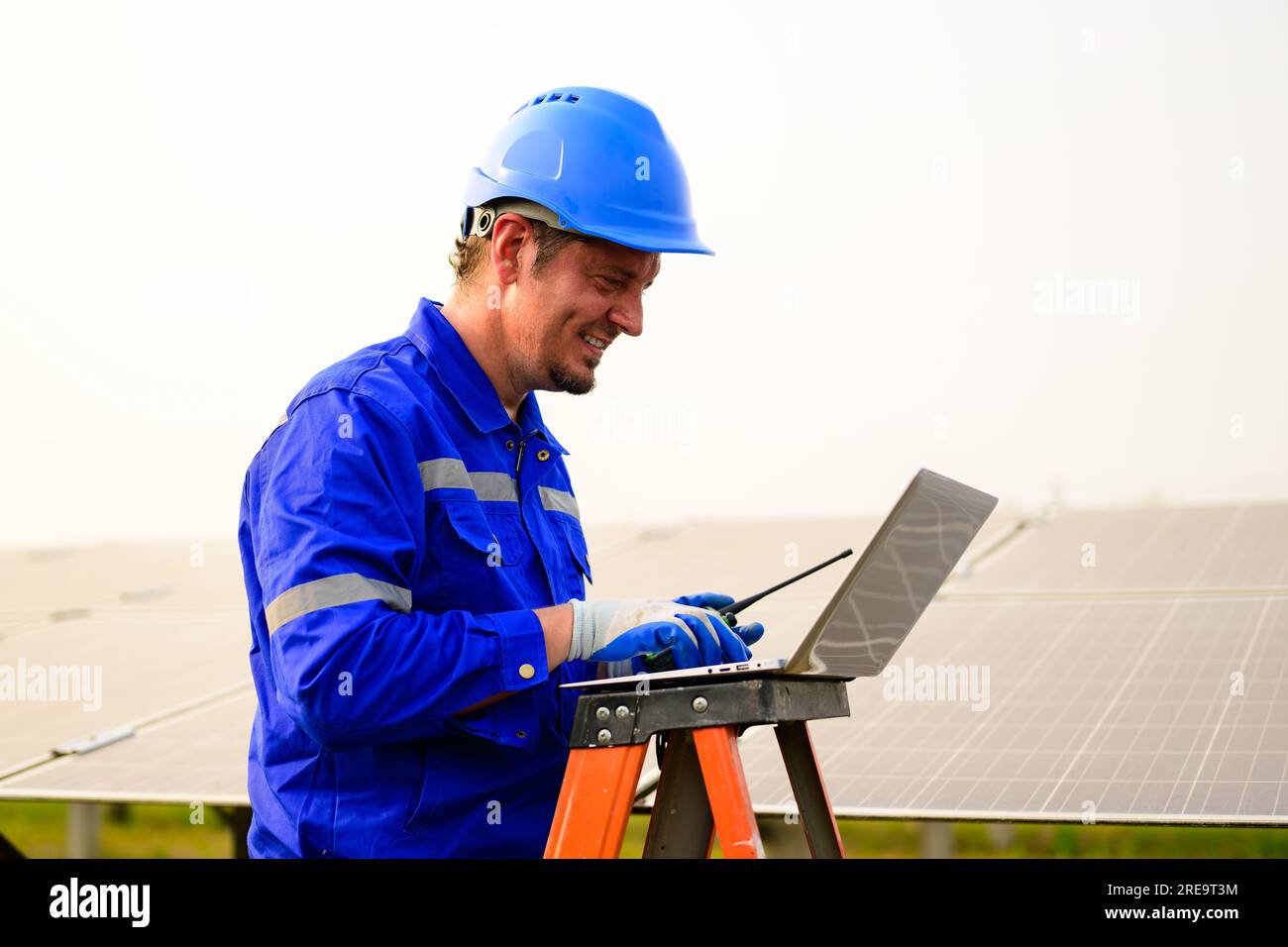 Engineer technician checking solar panels on solar power plant Stock ...