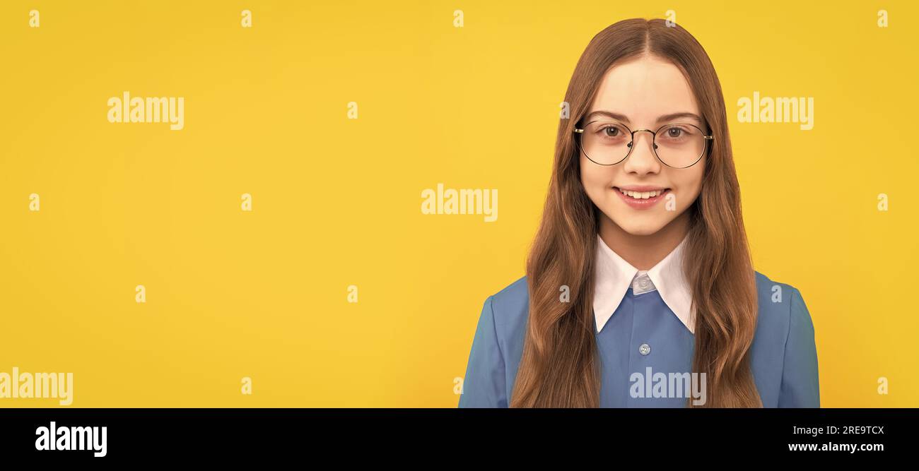 Tween girl. Happy girl child in eyeglasses yellow background. Girls ...