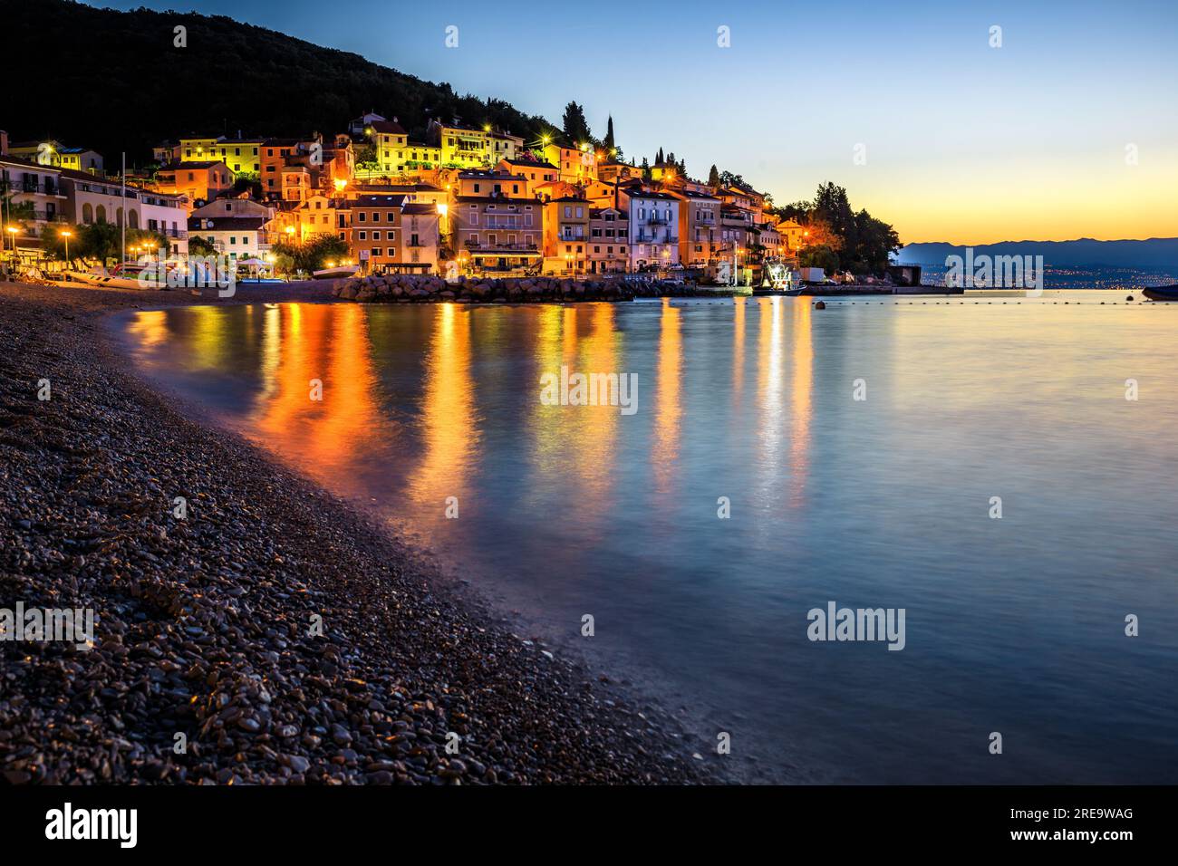 Moscenicka draga Istria in Croatia. Nice sea and beach photo with town ...