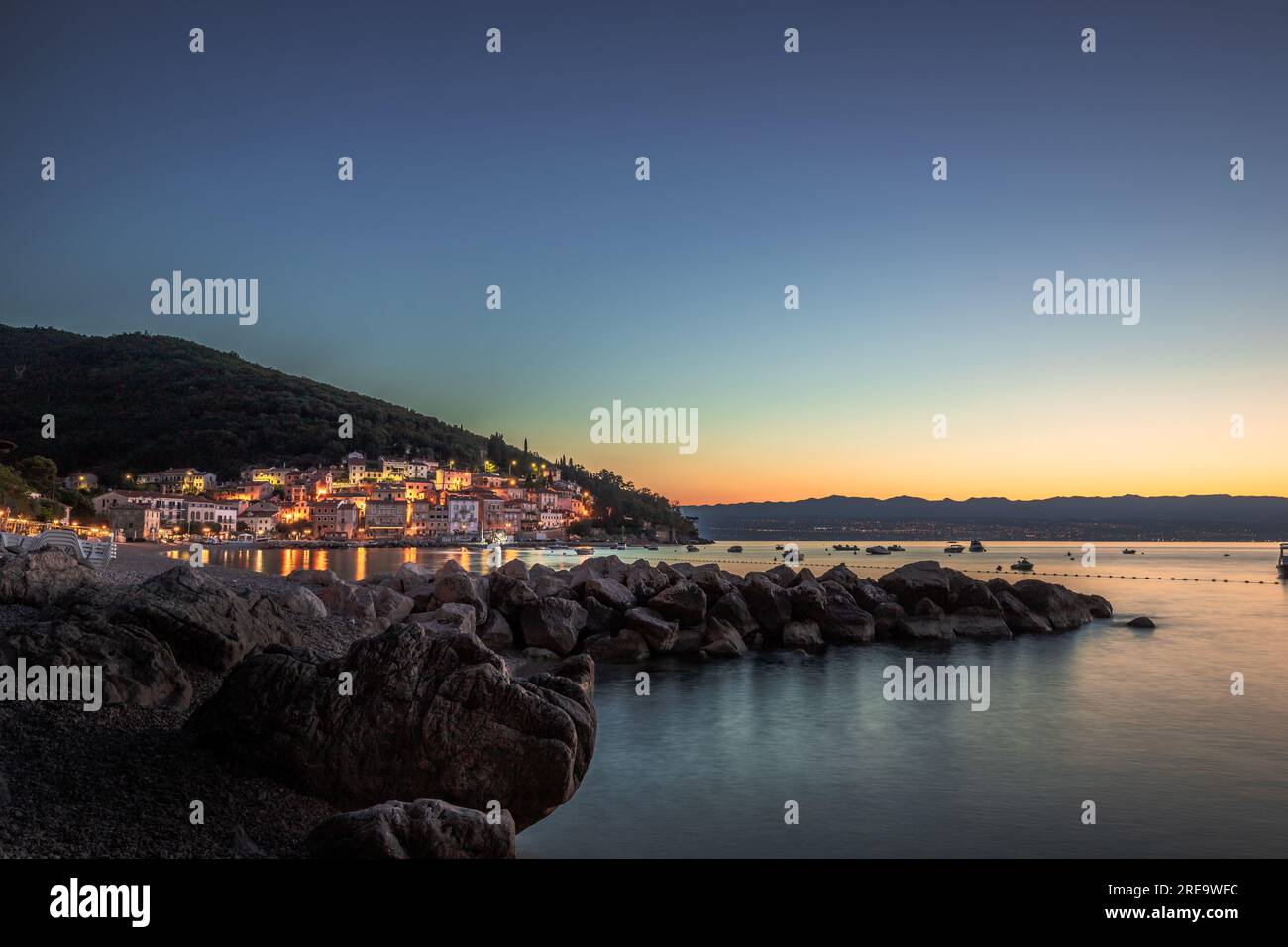 Moscenicka draga Istria in Croatia. Nice sea and beach photo with town ...