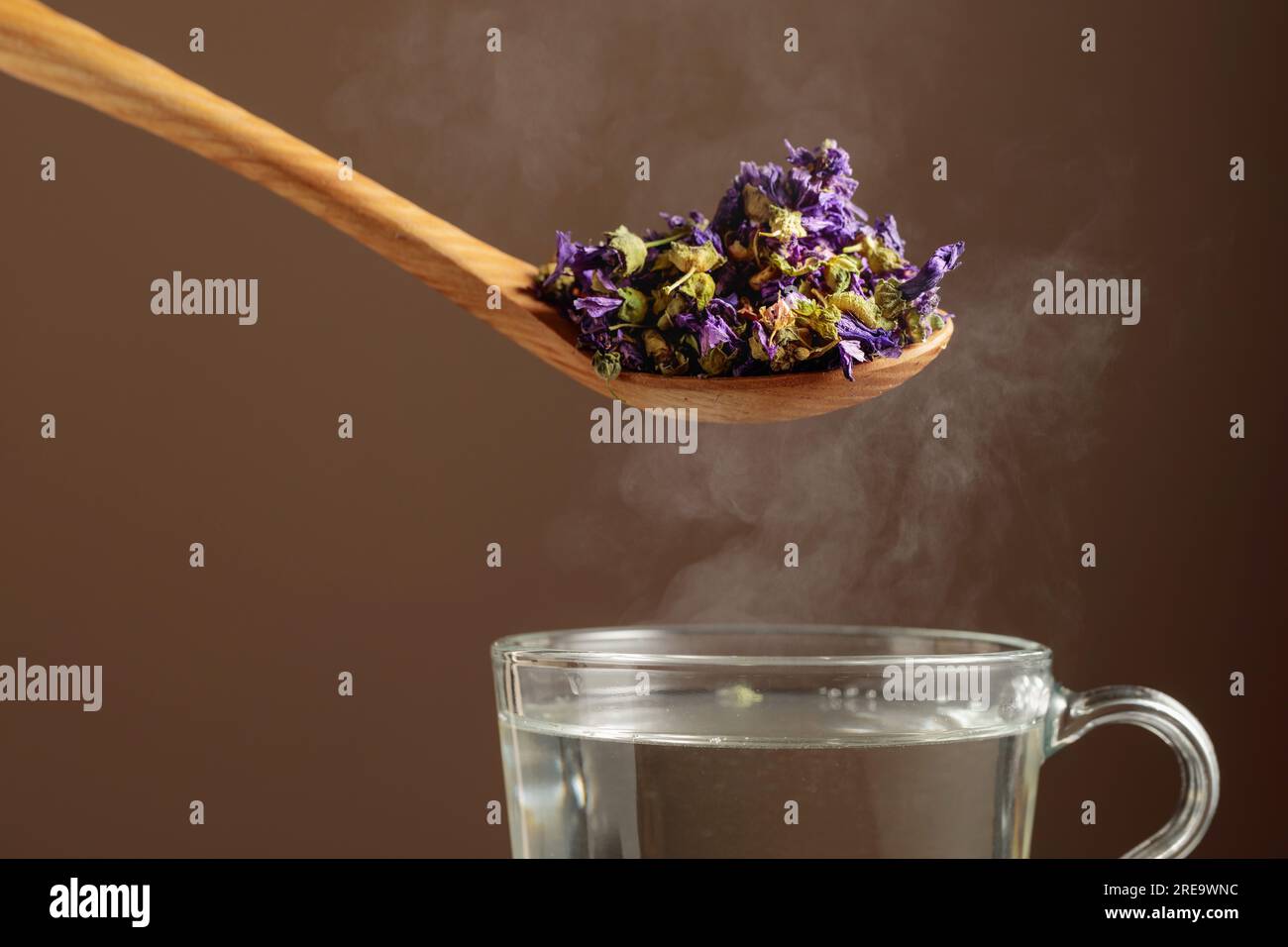 Dried mallow flowers for making herbal tea and mug with hot water Stock ...