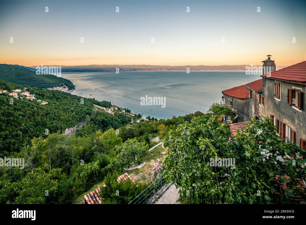 Moscenicka draga Istria in Croatia. Nice sea and beach photo with town ...
