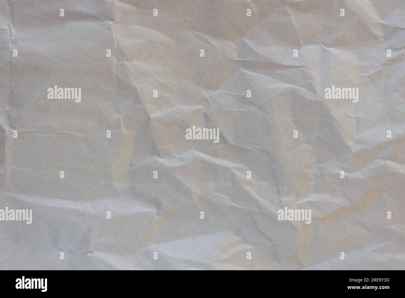 Texture of crumpled craft brown paper, background. Wrinkled parchment ...