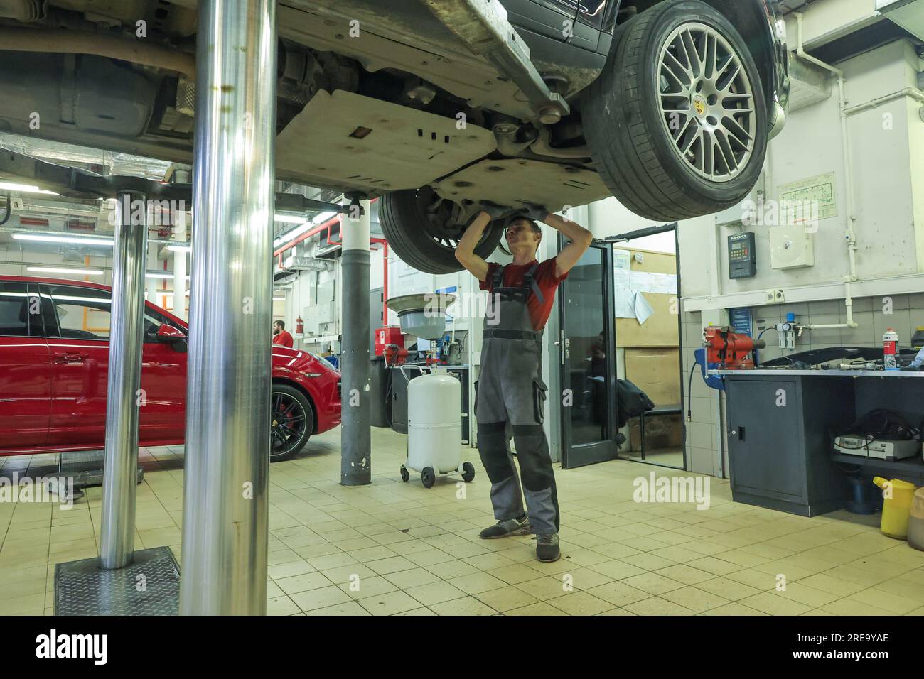 July 18. 2023. Russia. Moscow. A car mechanic performs car maintenance ...
