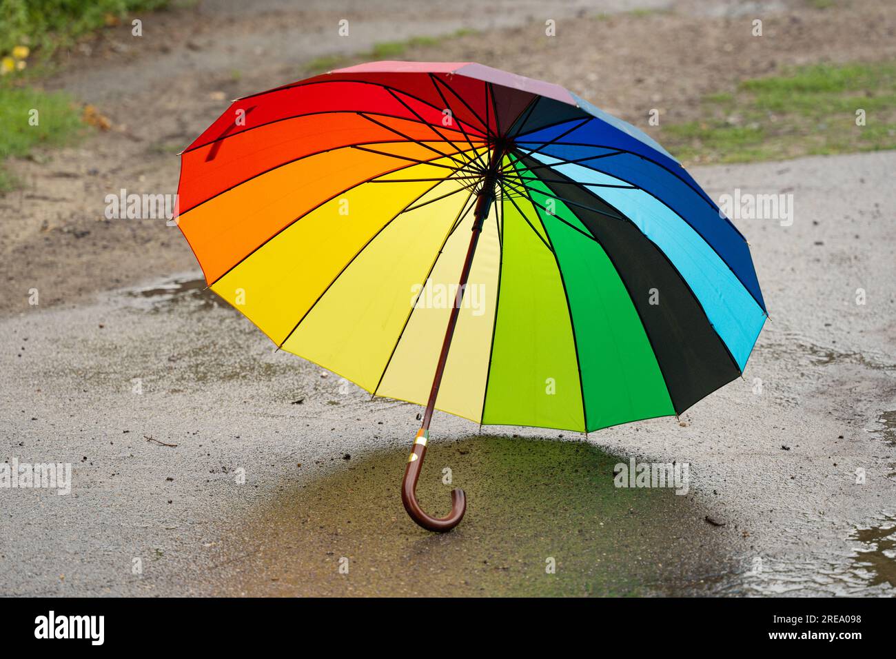 Colorful umbrella in the rain hi-res stock photography and images - Alamy