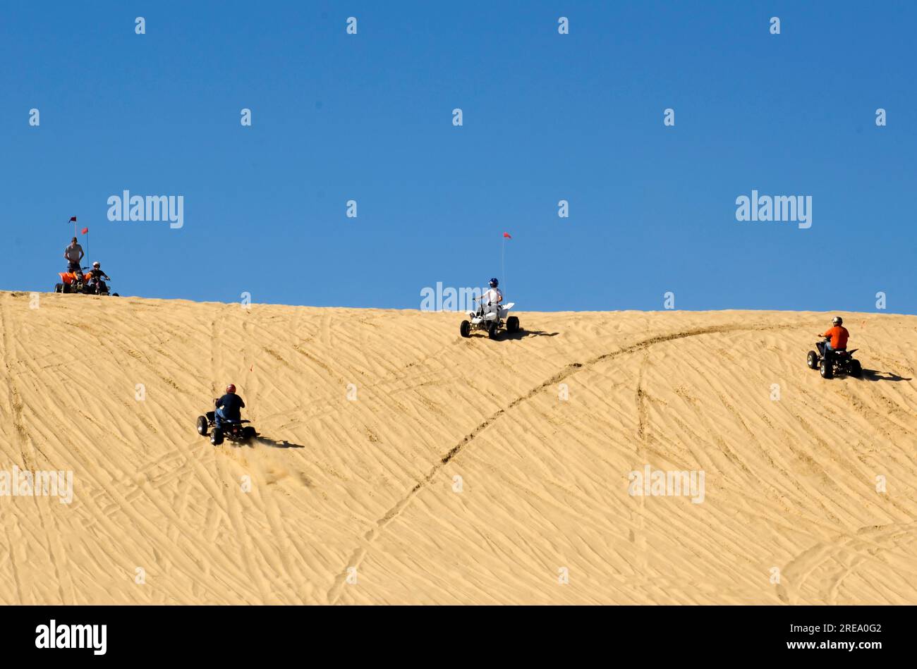 Dune buggy riders at park in Dunes City, Oregon, USA Stock Photo - Alamy