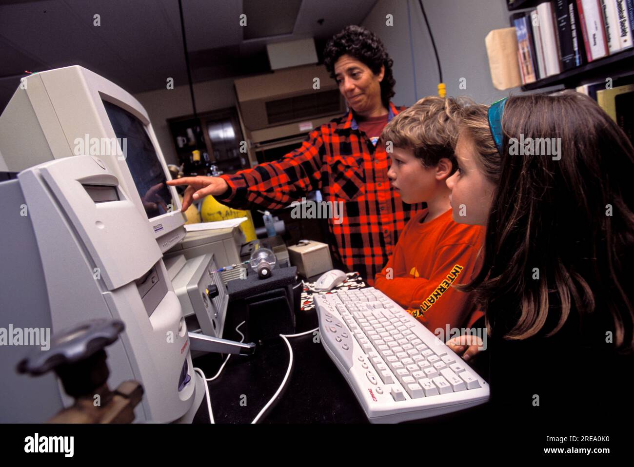 Women scientist and kids at Hawaii Volcanoes National Park working with ...