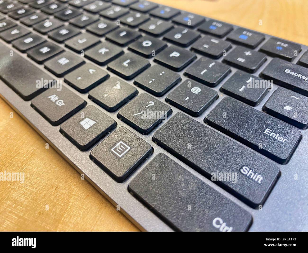 Computer keyboard on a desk Stock Photo - Alamy