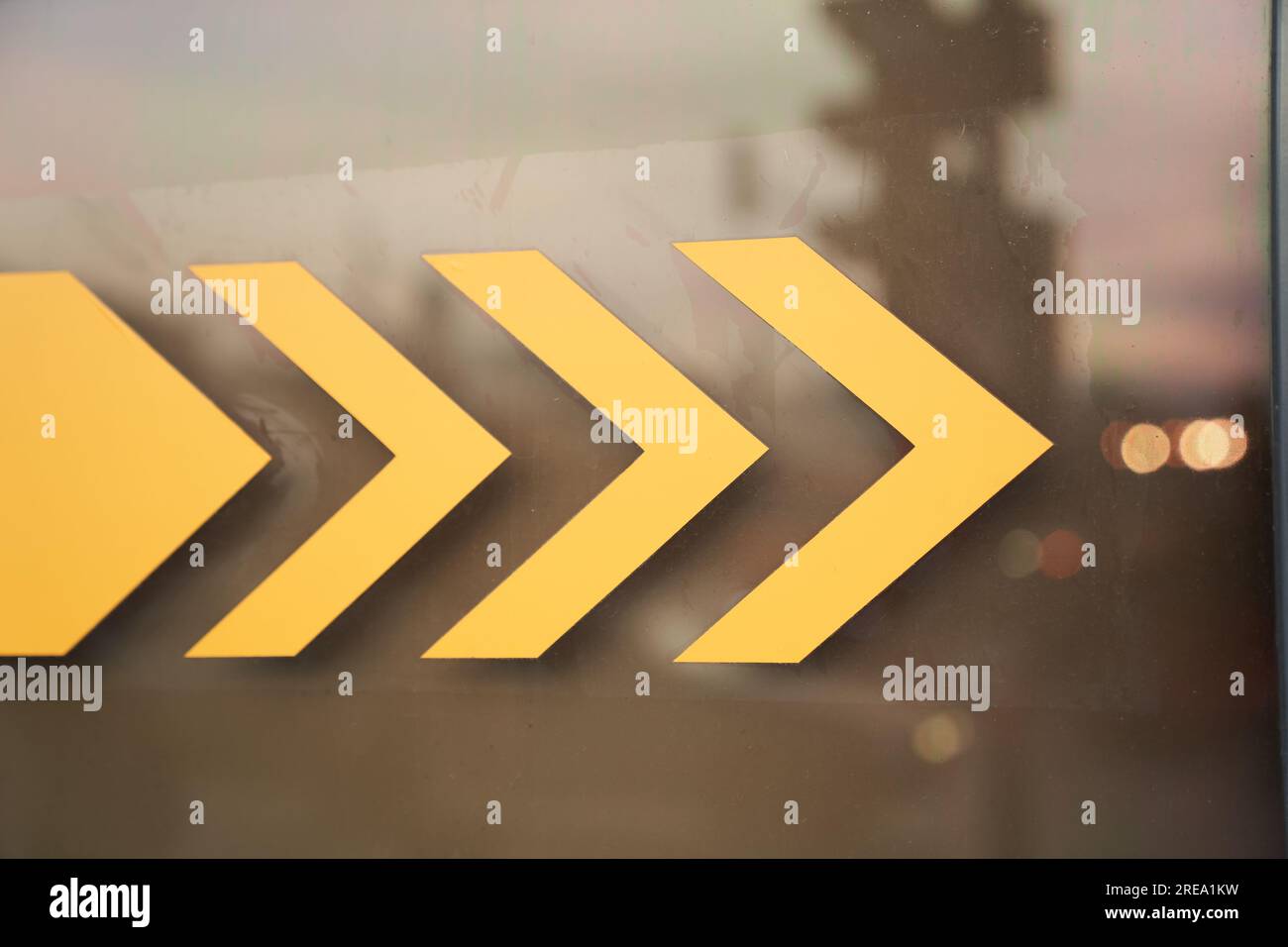 A close-up warning sign with space to copy. Exit turn sign with arrow ...