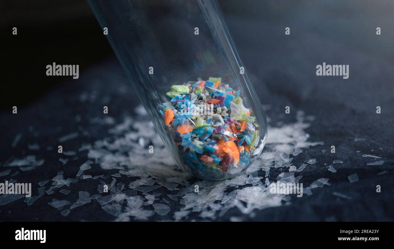 Macro shot of a test tube full of micro plastics collected from the ...