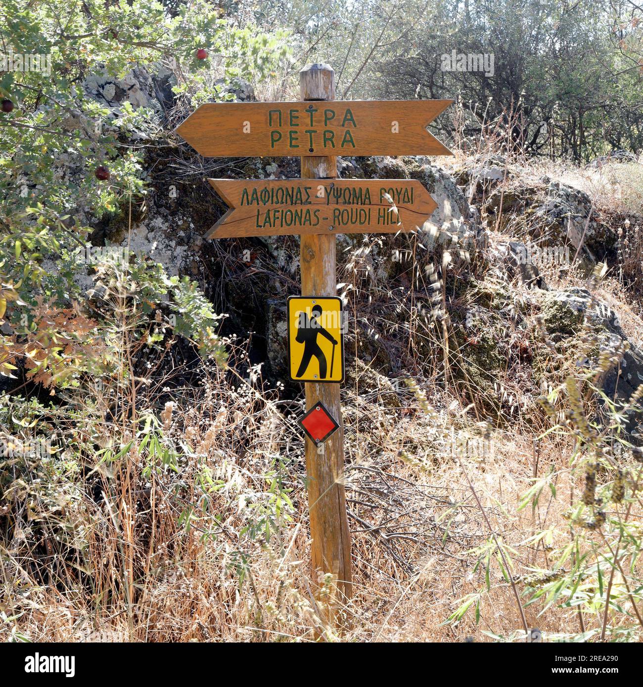 Greek sign for walking paths to Petra village and Lafionas to Roudi ...