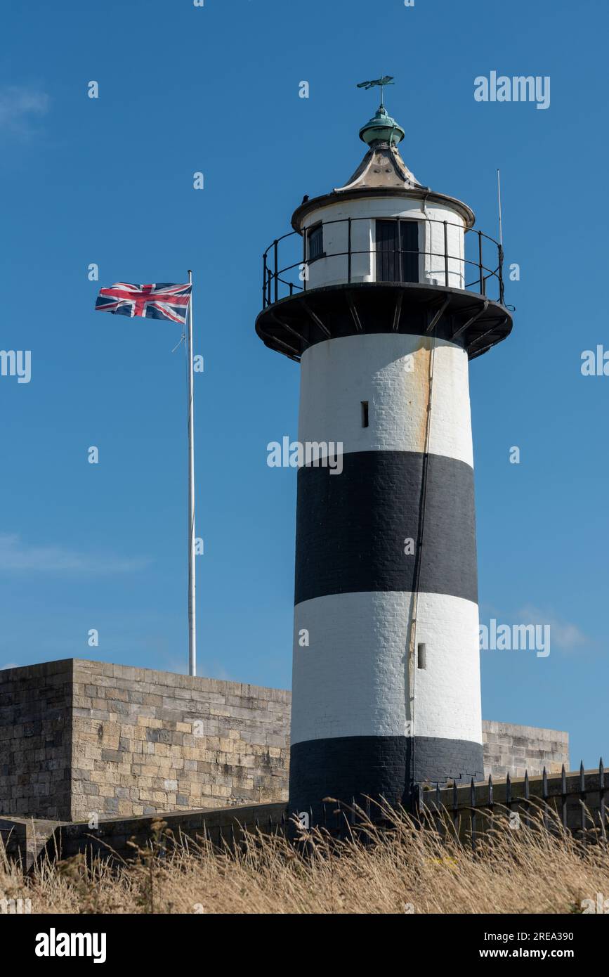 The black and white striped lighthouse on top of Southsea Castle in ...