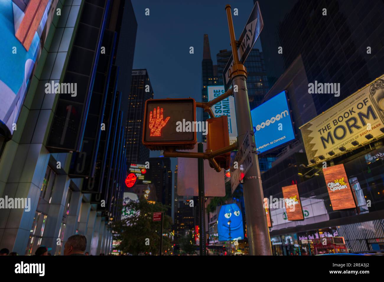 View of Red hand as stop road sign on Broadway on night New York ...