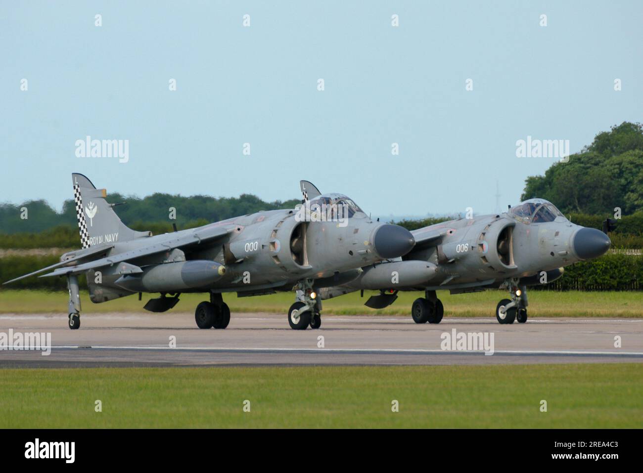 Pair of BAe Sea Harrier FA2 fighter jet planes lining up to take off to ...