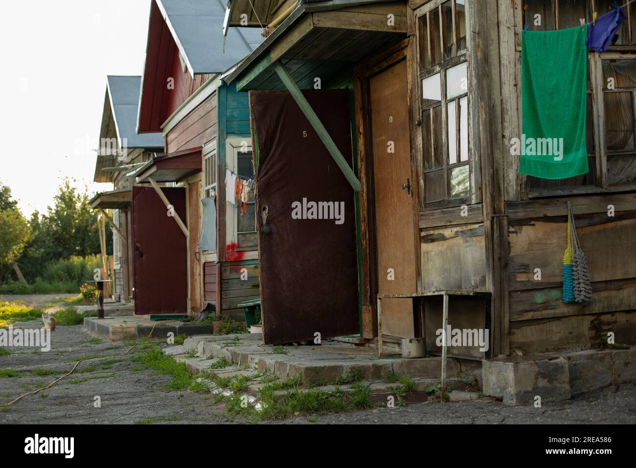 Housing in poor area. Hut in village. House made of old boards. Poor ...