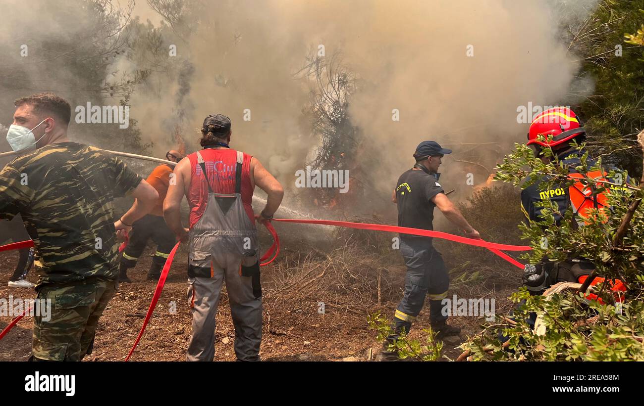 Firefighters battle fires in the southern part of the Greek island of ...