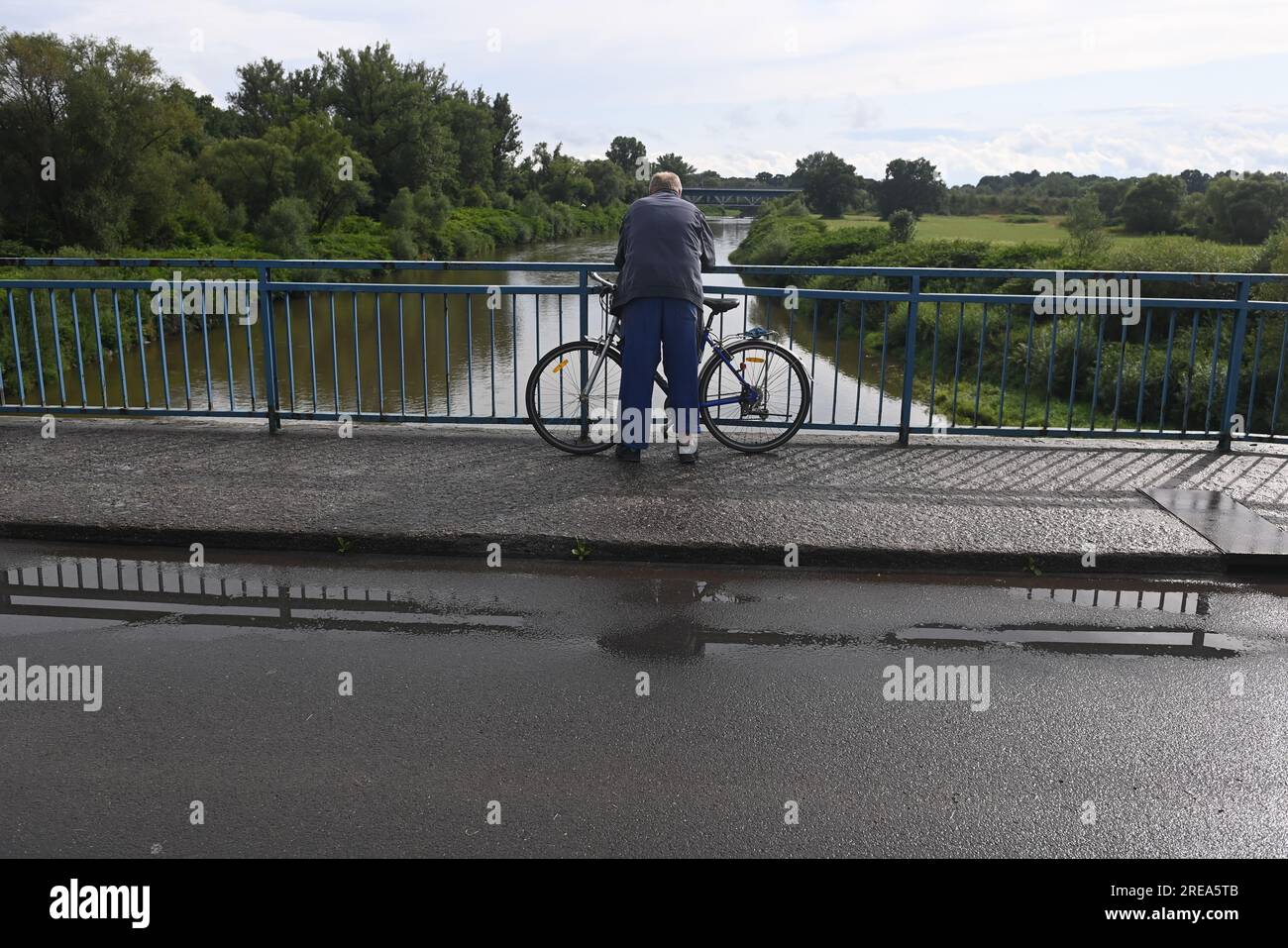 Bohumin, Czech Republic. 26th July, 2023. A man with a bicycle at the ...