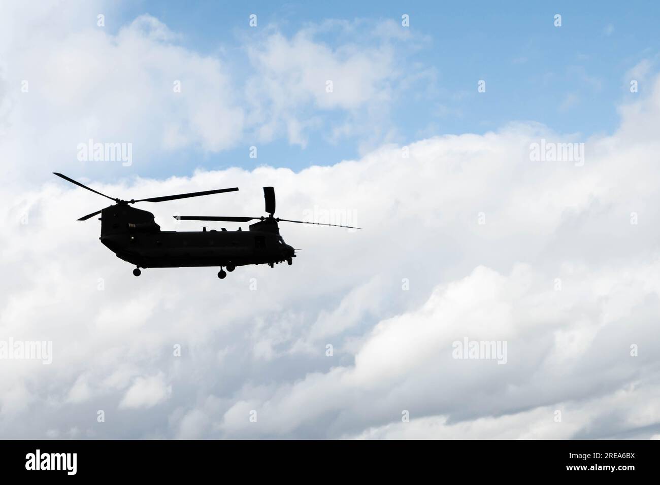 Silhouette of a Boeing V-22 Osprey aircraft on a blue sky Stock Photo ...