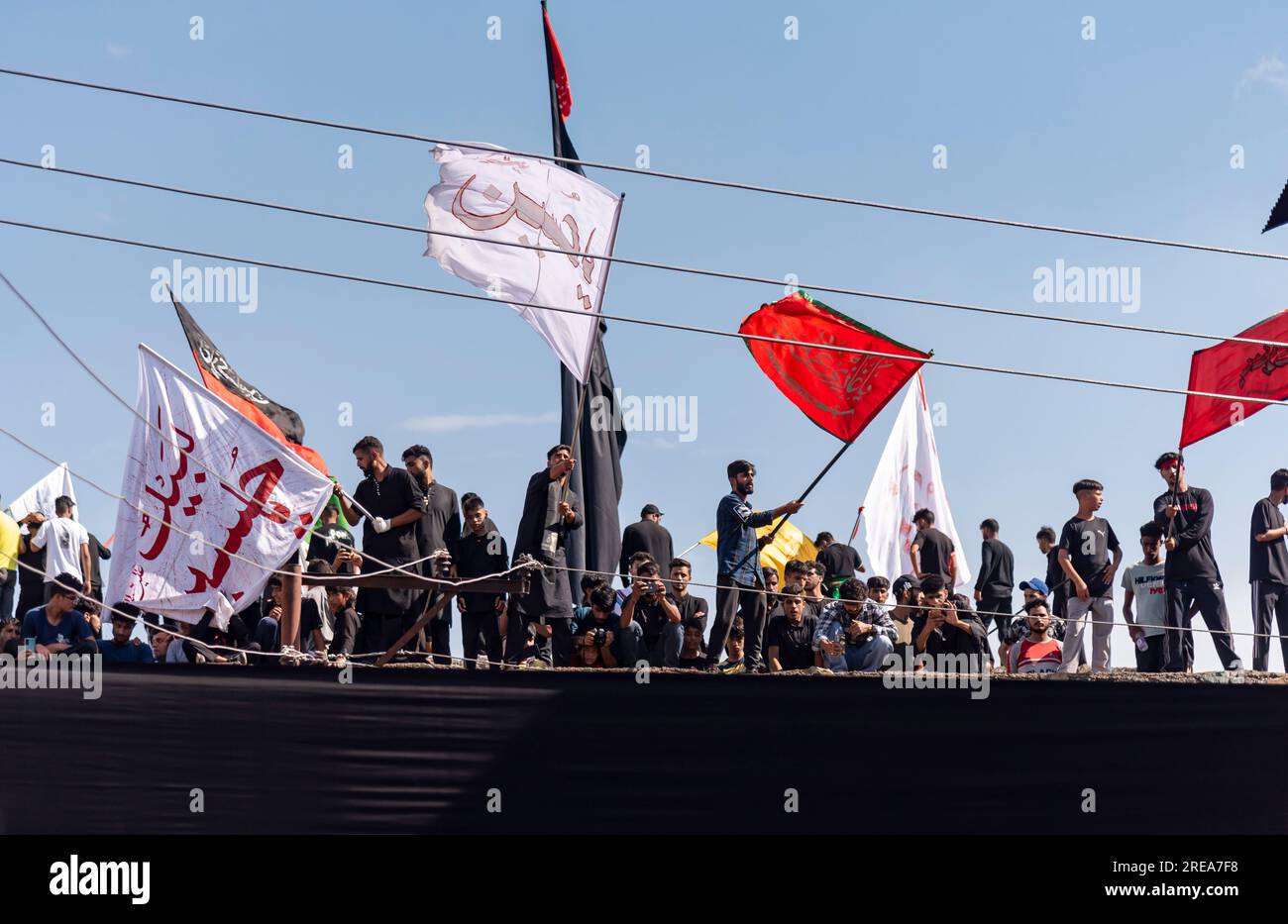 Mourners wave flags hi-res stock photography and images - Alamy