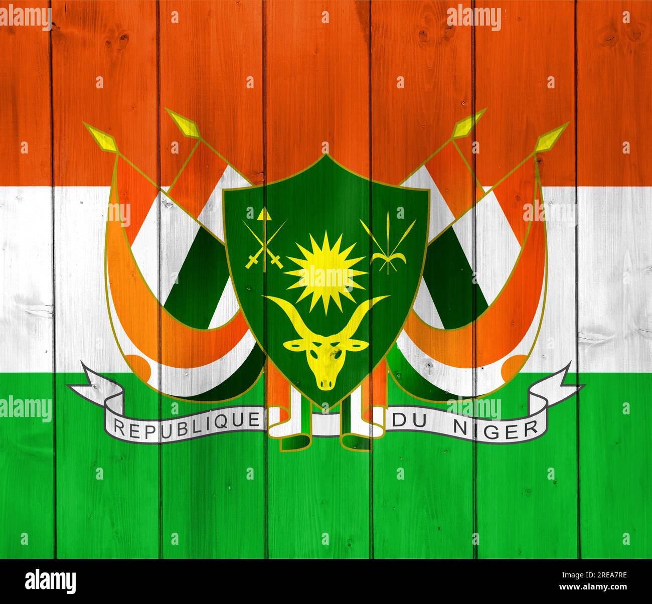 Flag and coat of arms of Republic of Niger on a textured background ...