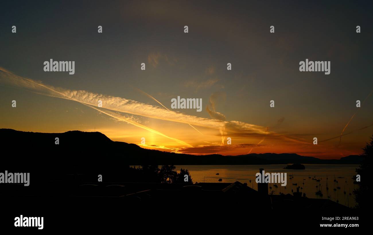 Sunset over an inlet Stock Photo - Alamy