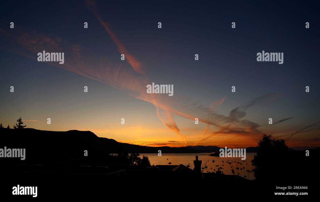 Sunset over an inlet Stock Photo - Alamy