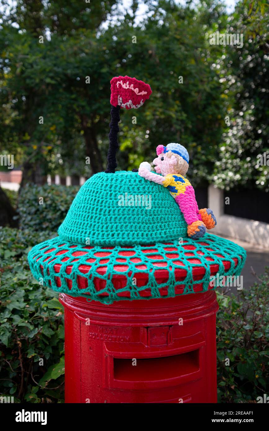 A knitted post box topper celebrating the 2023 Open Golf Championship ...
