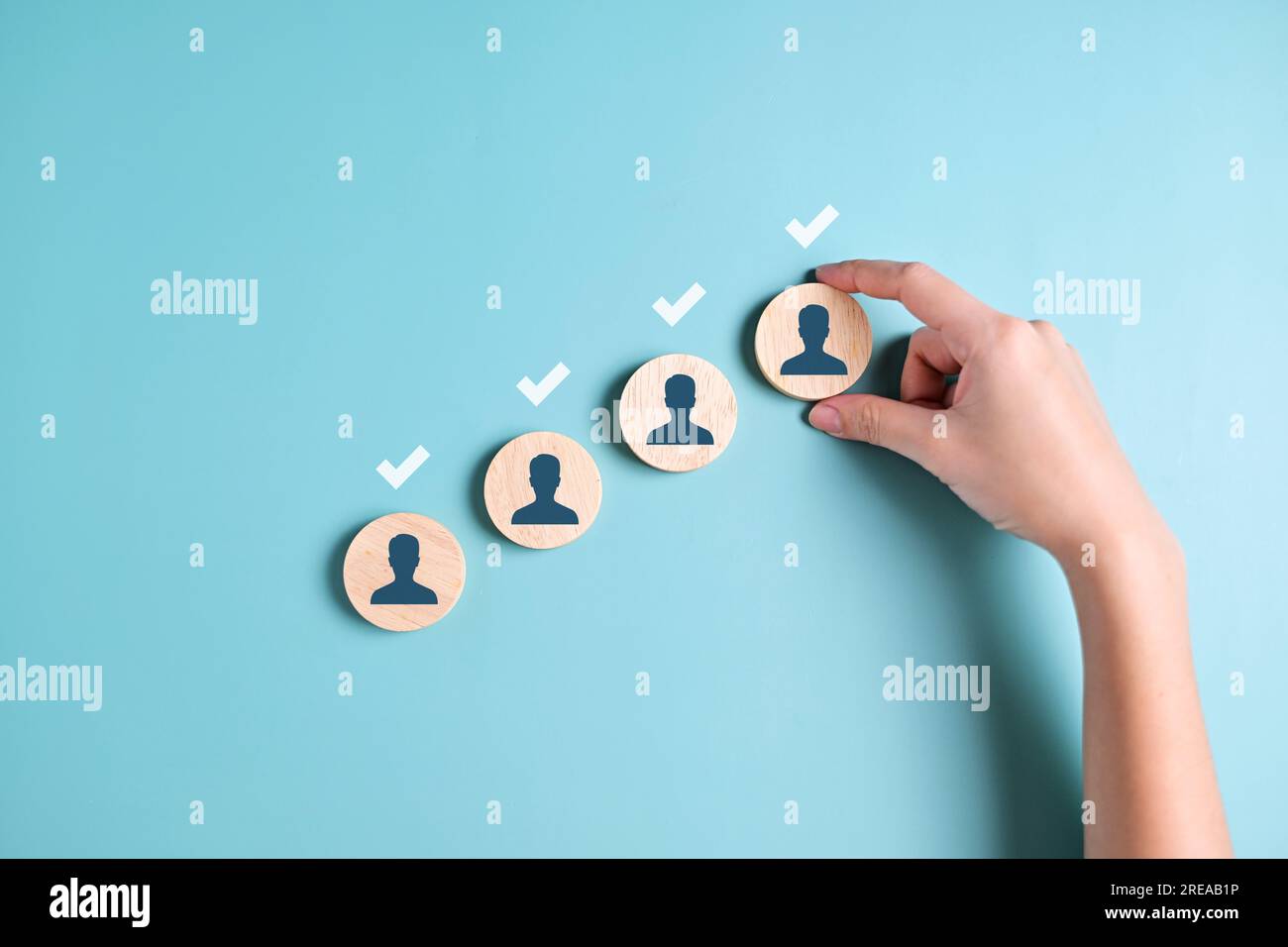 Wooden block with teamwork employees business icons, People with smart ...