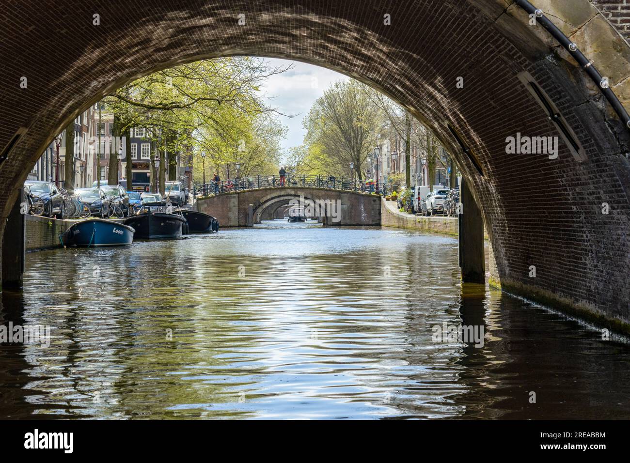 Canal bridges over the water between the streets of Amsterdam Stock ...