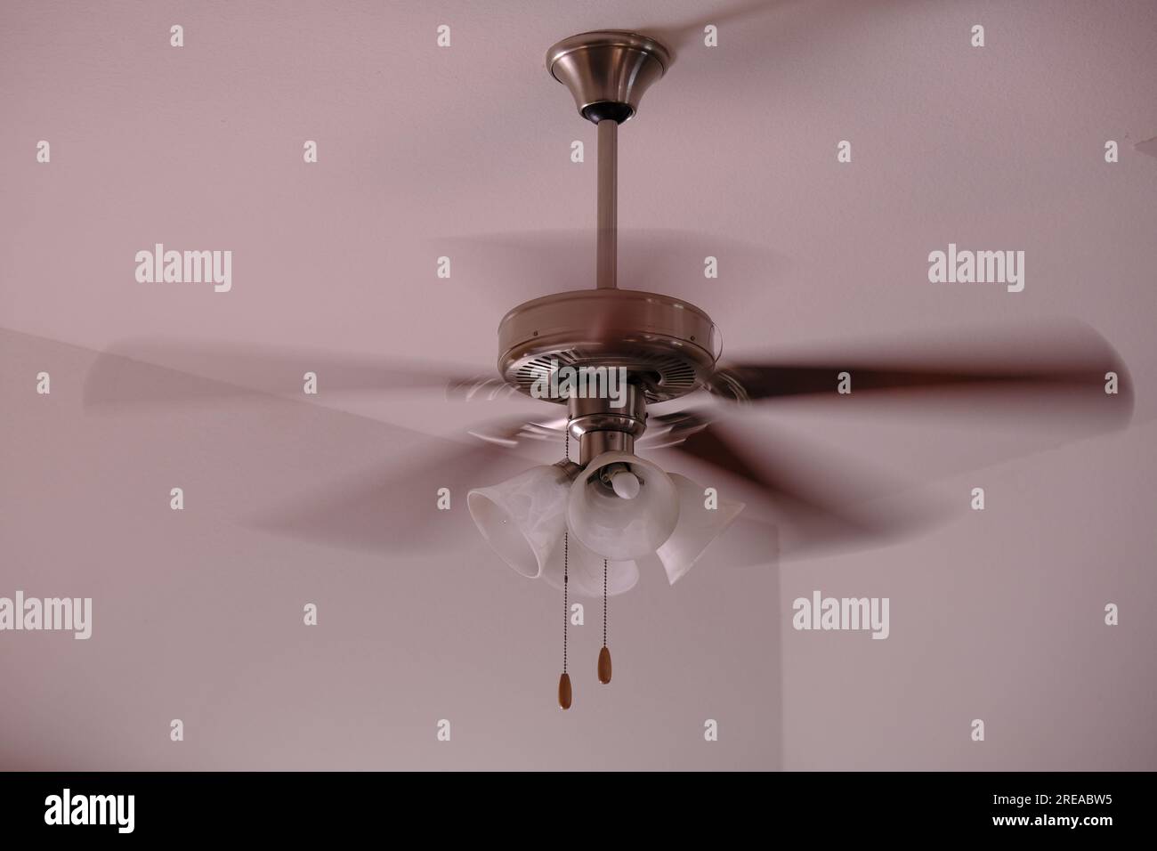 Spinning Ceiling Fan Stock Photo - Alamy