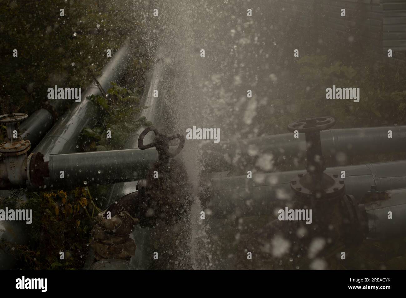 Pipeline accident. Water pours from well. Torn valve. Emergency Stock ...