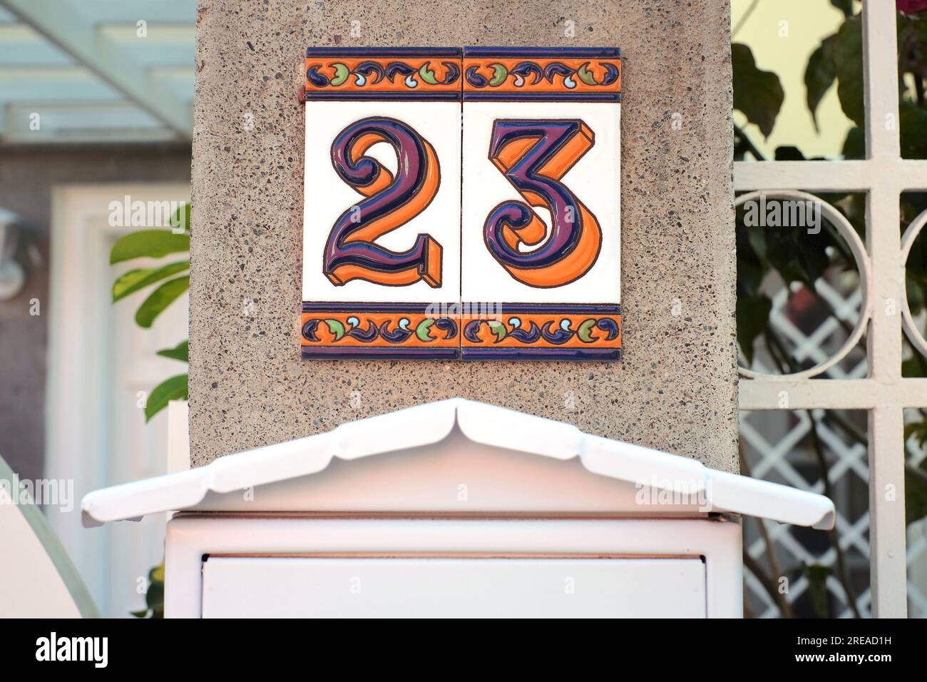 Number 23, twenty-three, decorative tiles above a letter box Stock ...